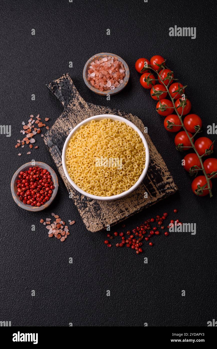 Raw anellini pasta from durum wheat with salt and spices Stock Photo ...