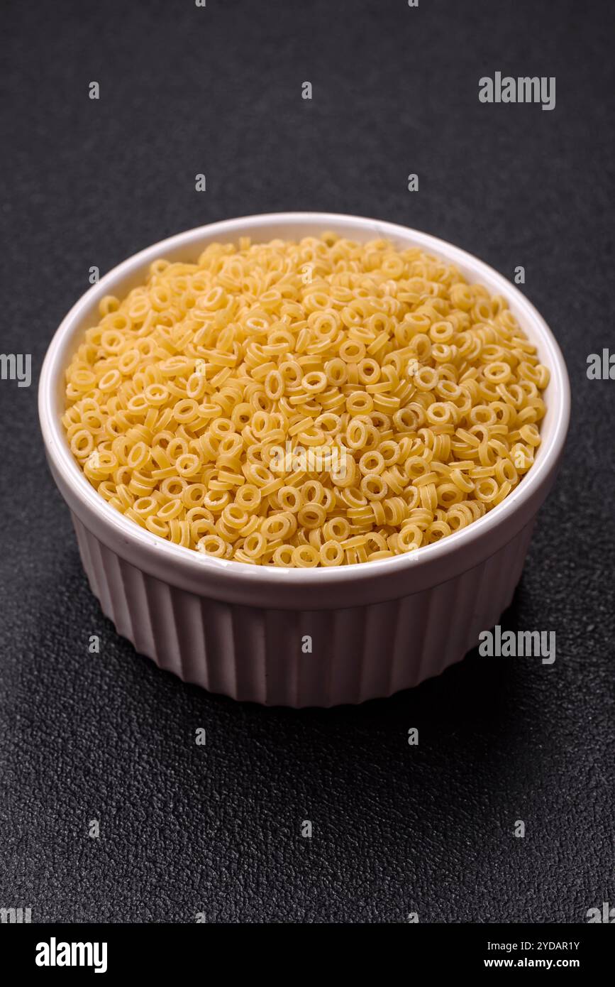 Raw anellini pasta from durum wheat with salt and spices Stock Photo ...