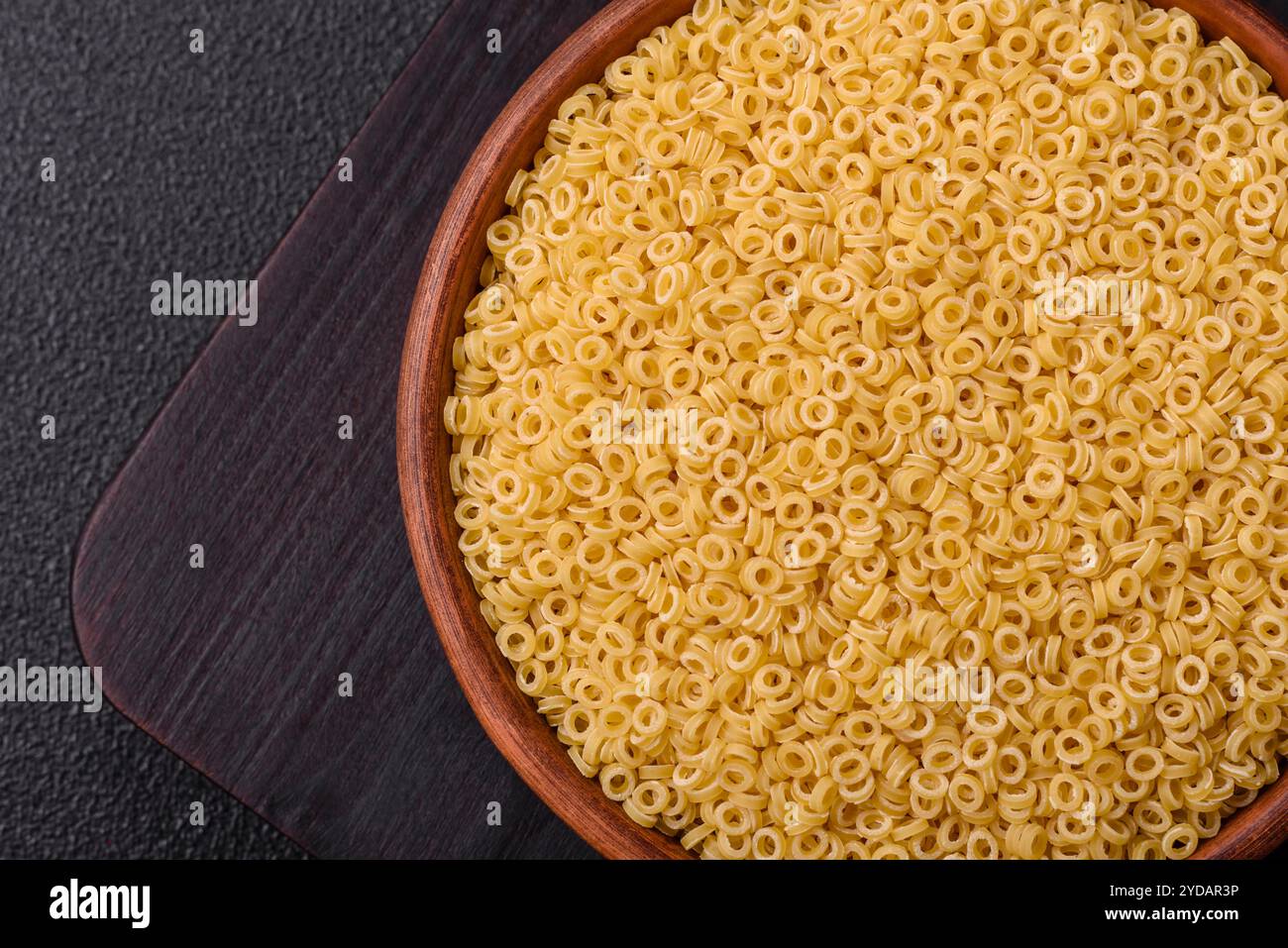 Raw anellini pasta from durum wheat with salt and spices Stock Photo ...