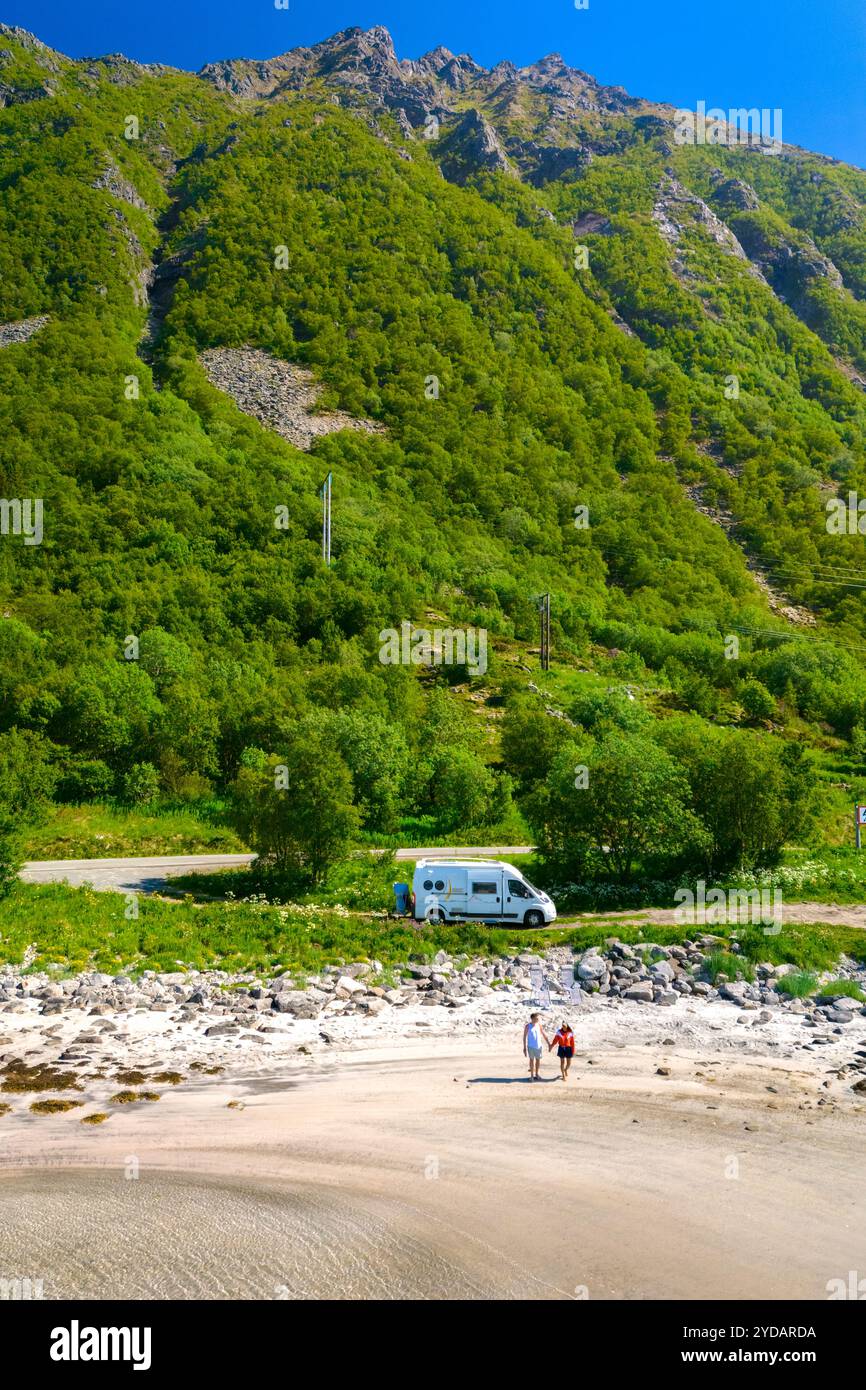 Couple Exploring a Remote Norwegian Beach, Lofoten Norway Stock Photo ...