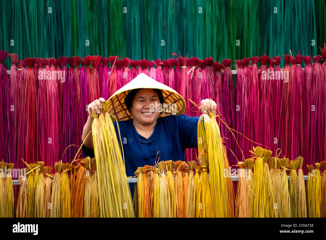 Processing of flax trees into different colors to be weaved into mats ...