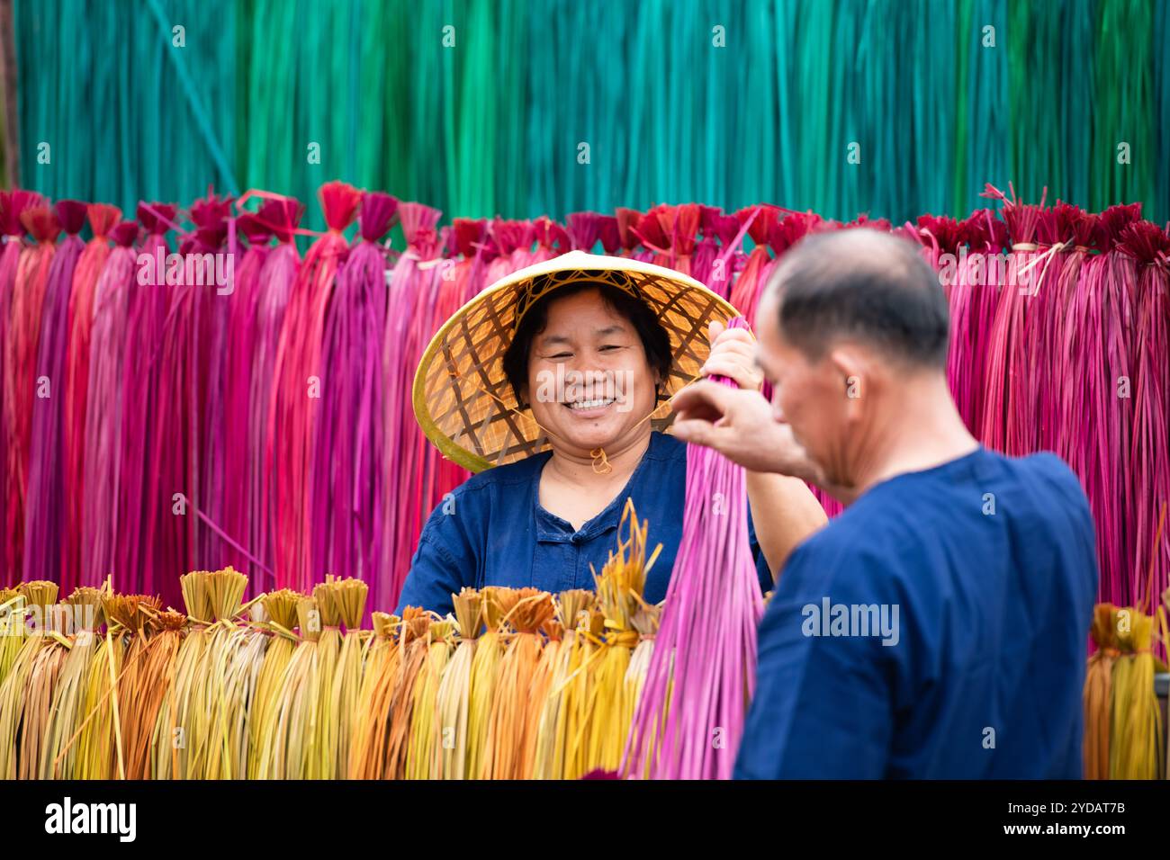 Processing of flax trees into different colors to be weaved into mats ...