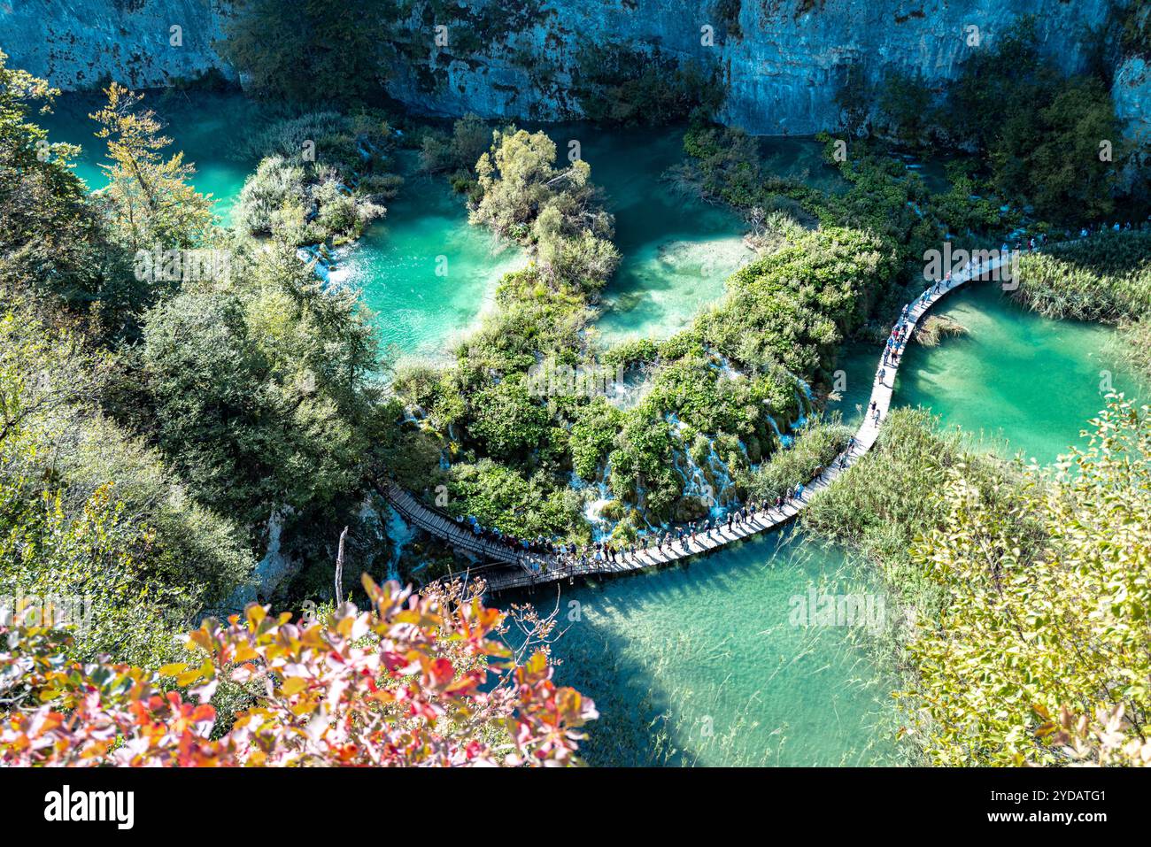 Waterfalls in the forest flowing into lakes. Tourists visit famous ...