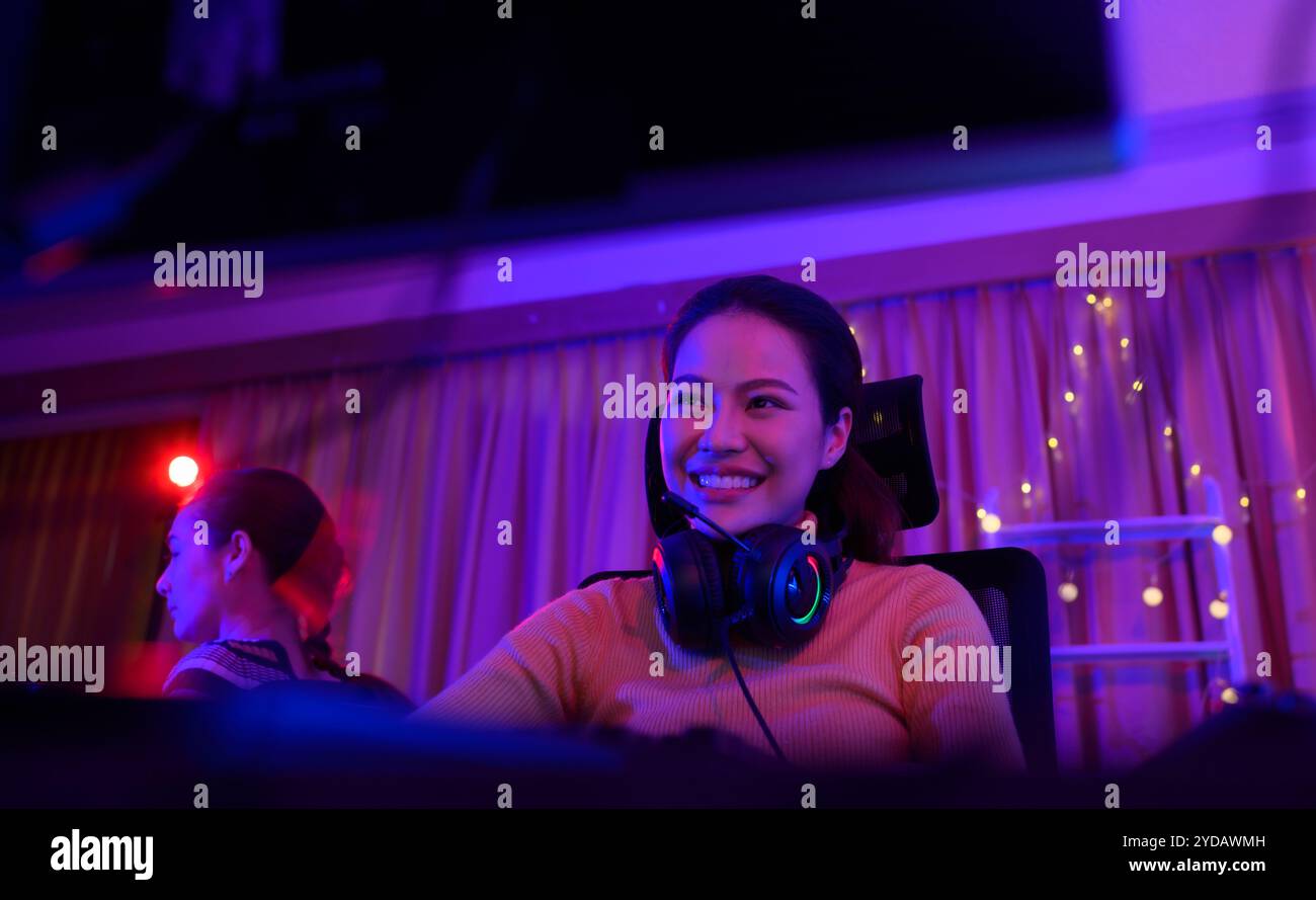 An active and serious young woman gamer on his powerful personal ...