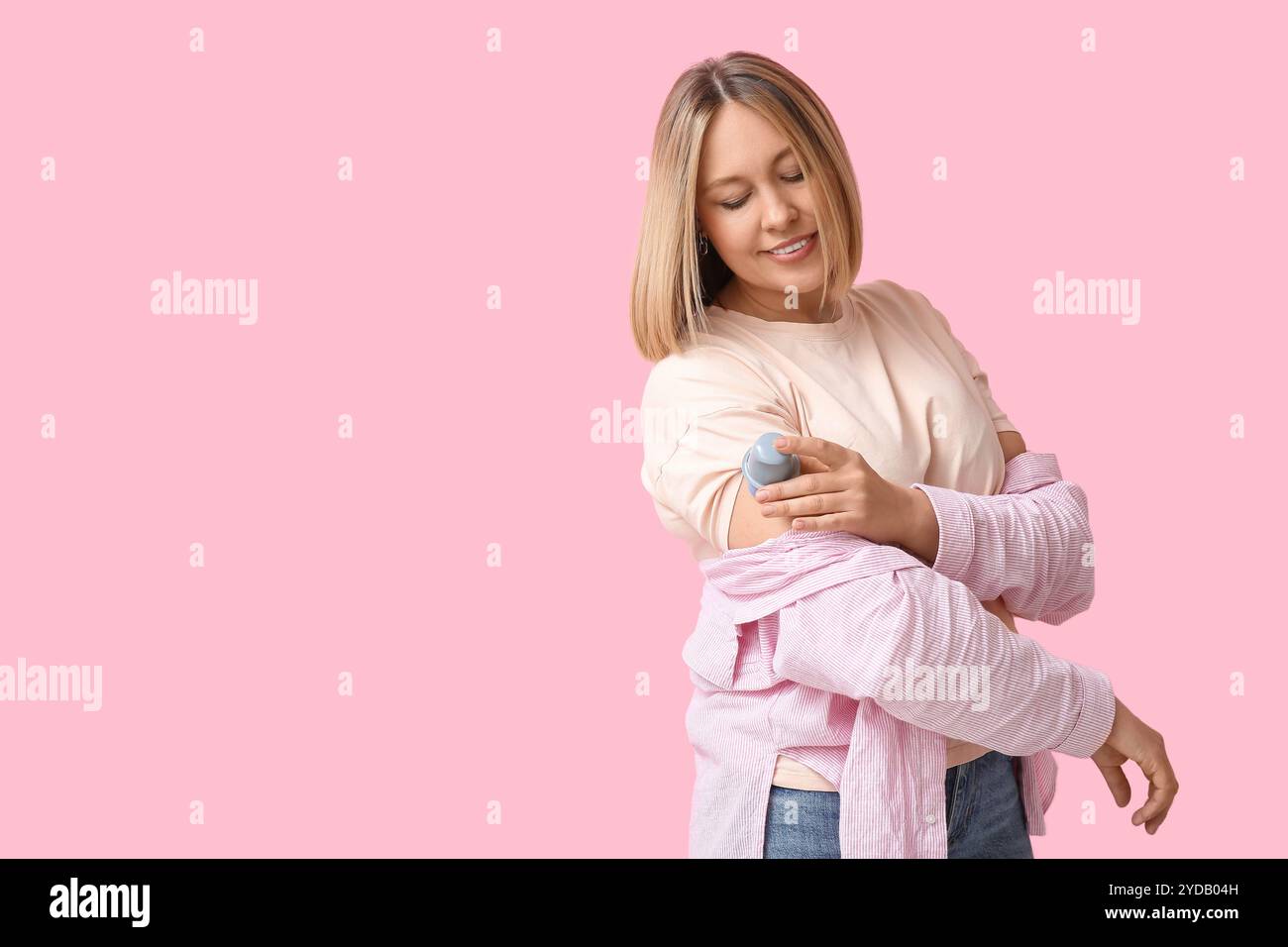 Woman with glucose sensor for measuring blood sugar level and ...