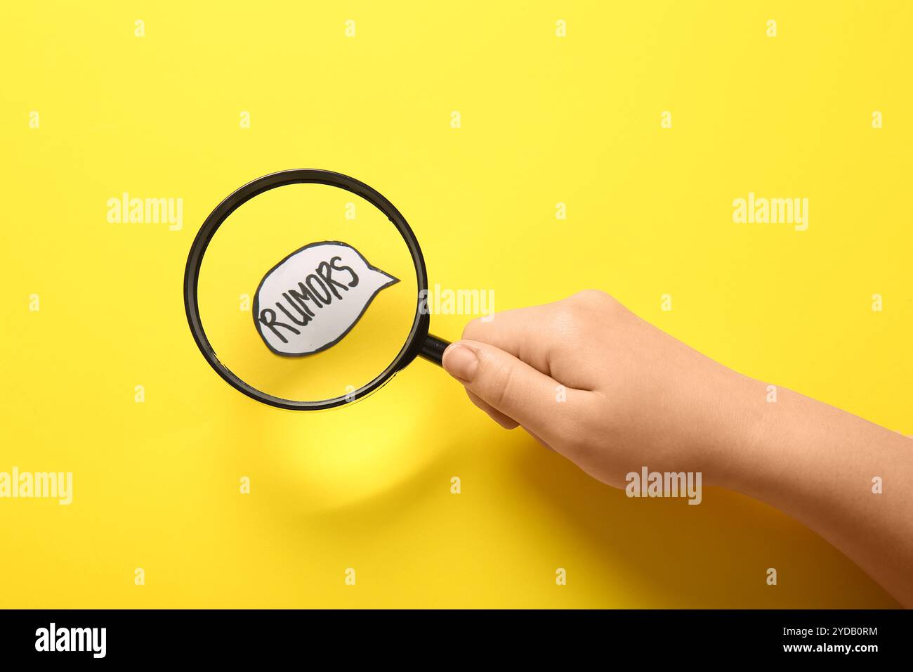 Woman magnifying speech bubble with word RUMORS on yellow background ...