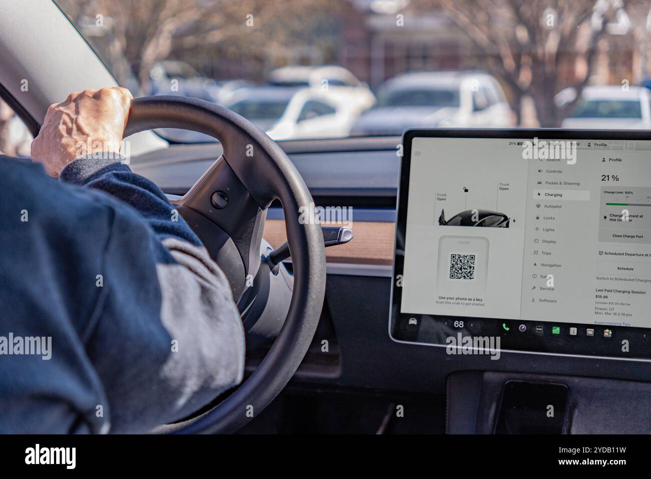Salt Lake City, UT, US-March 19, 2024: Driver and interior of a Tesla ...
