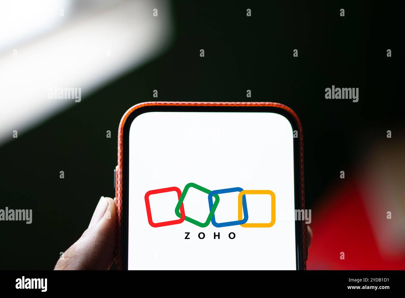 Dhaka, Bangladesh- 16 July 2024: Zoho logo is displayed on smartphone Stock Photo - Alamy