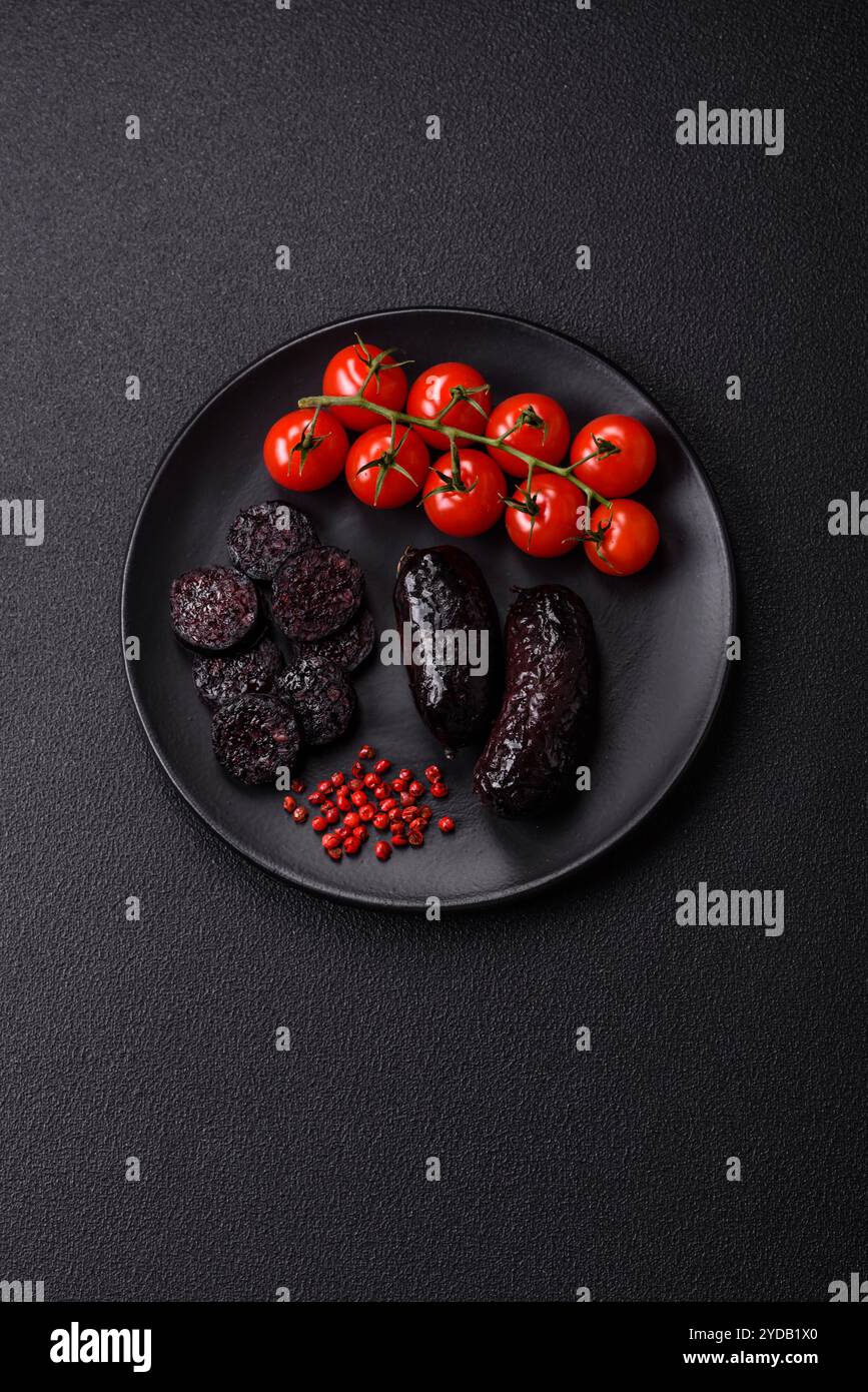Delicious black blood sausage or black pudding with spices Stock Photo ...