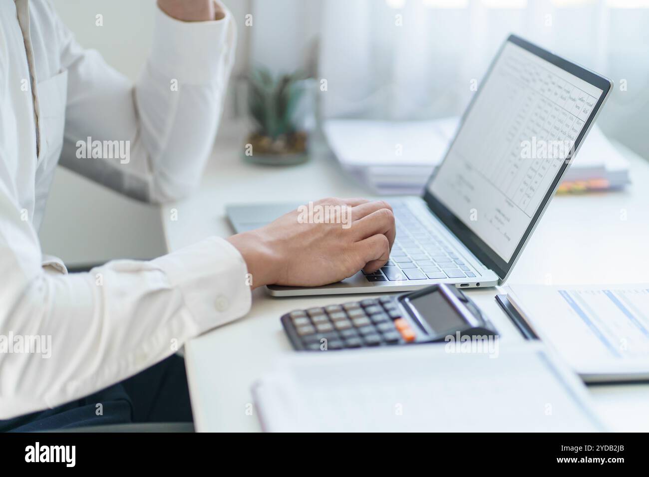 Asian Business man working with laptop. Young business man thinking ...