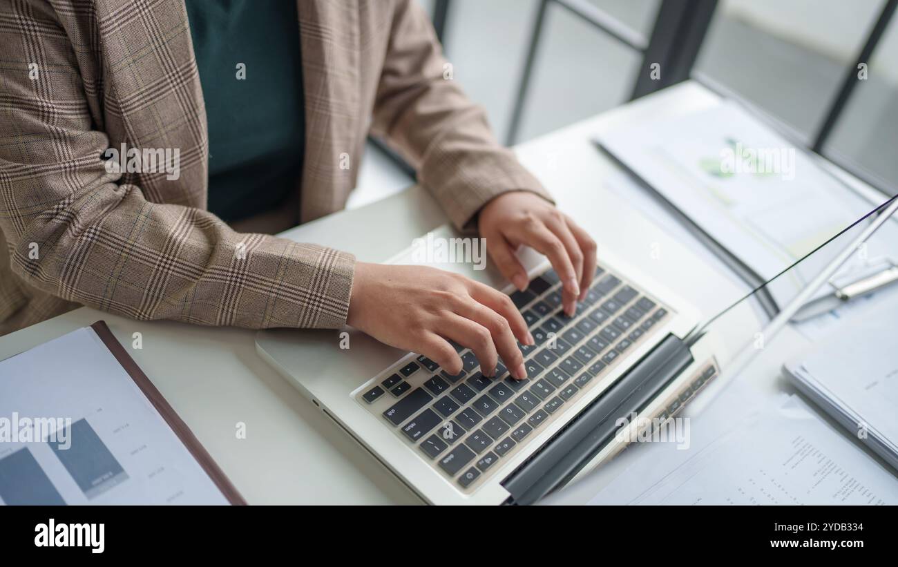 Business woman working with laptop Hands typing keyboard. Professional ...
