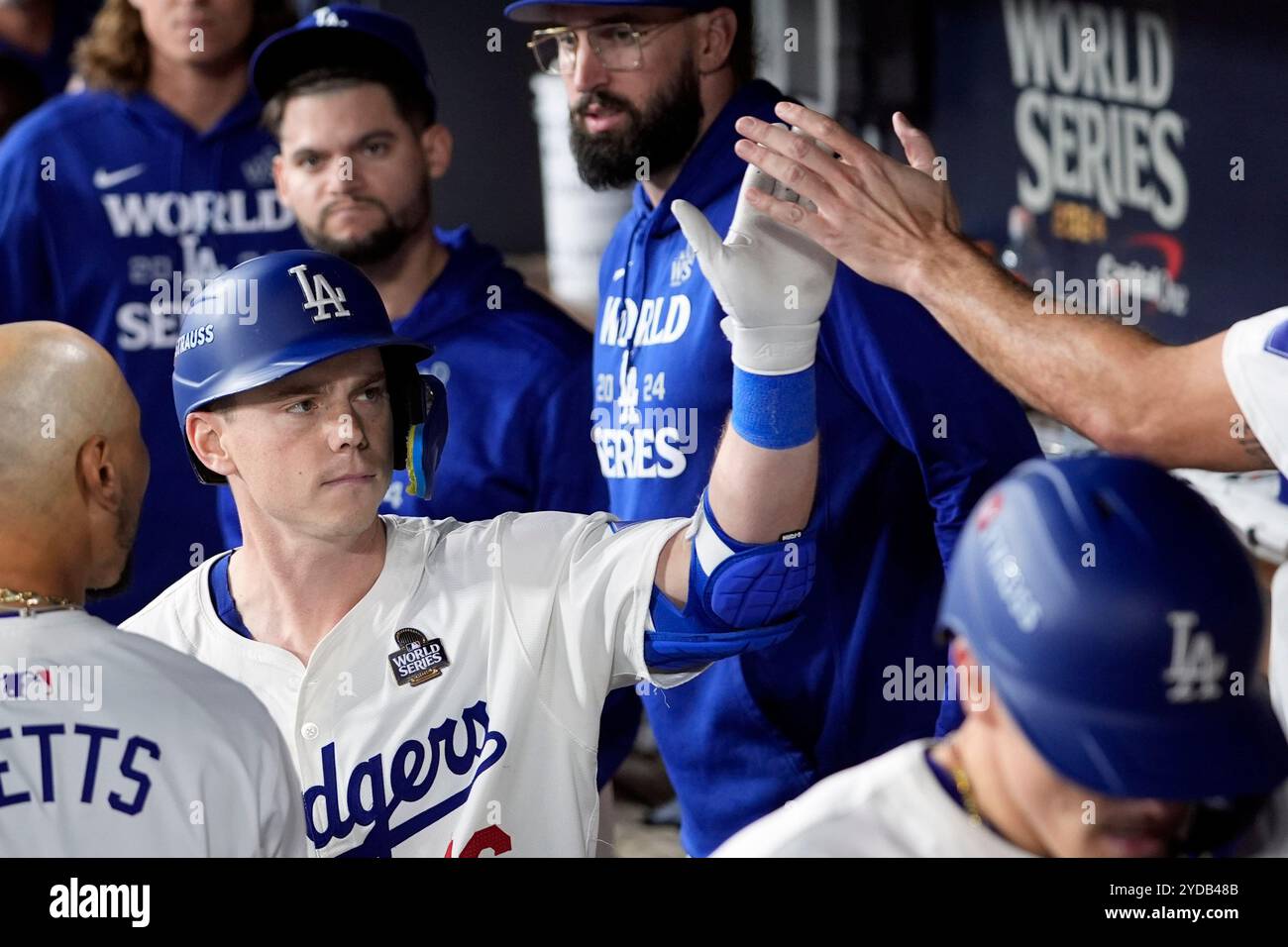 Los Angeles Dodgers' Will Smith celebrates in the dugout after hitting ...