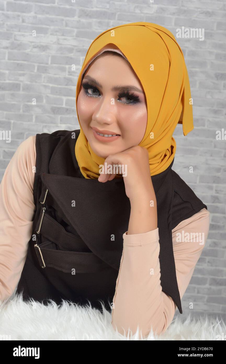 Portrait Beautiful Muslim Asian Girls wearing brown Muslim clothes and ...
