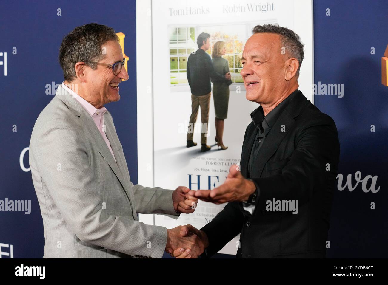 Thomas Rothman, left, and Tom Hanks arrive at the AFI Fest premiere of ...