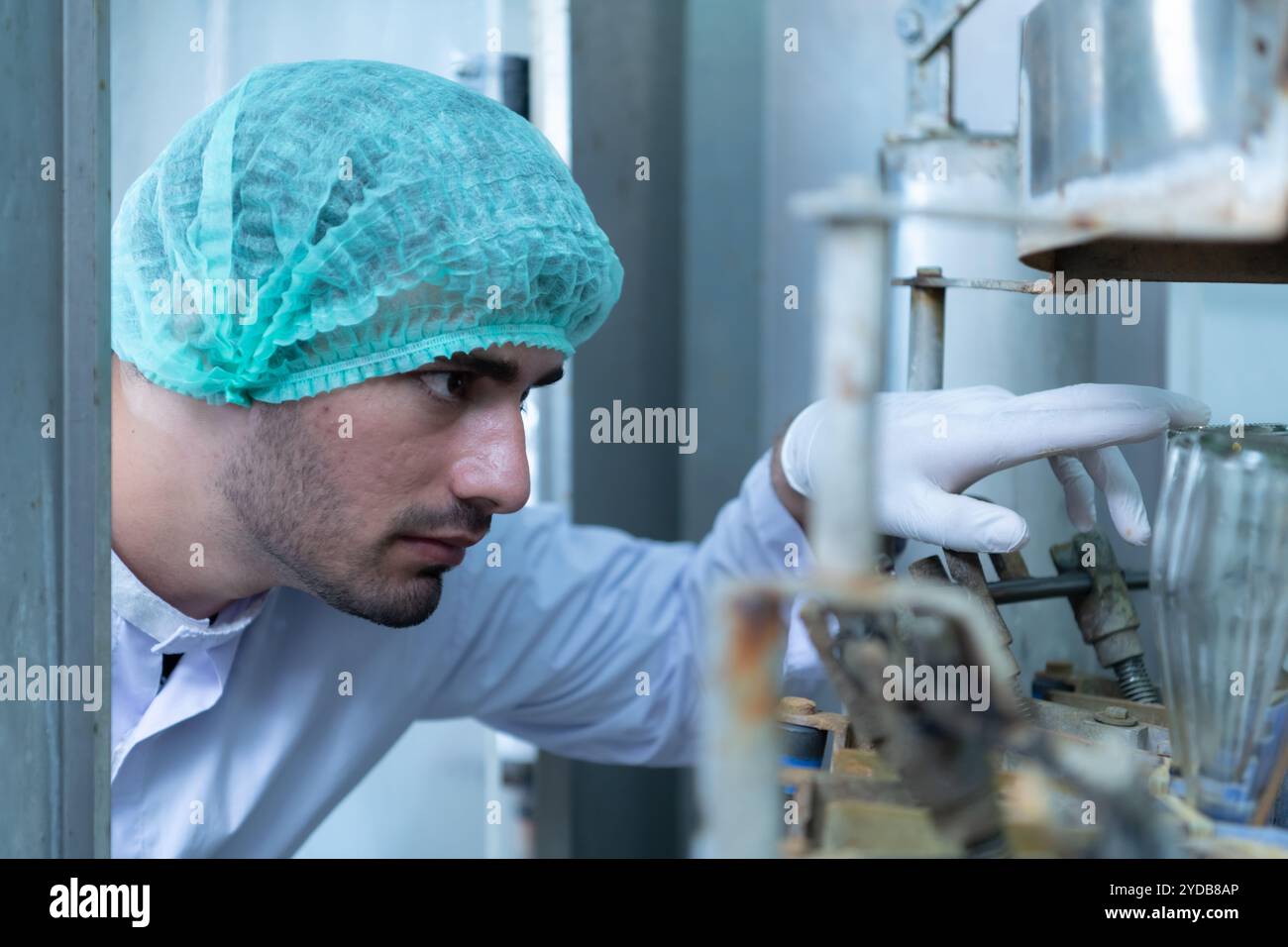 Product quality control officer in fruit juice production line Carry ...