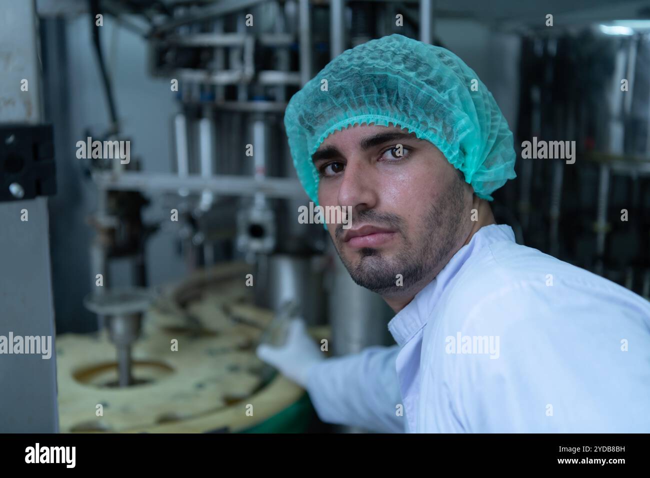 Product quality control officer in fruit juice production line Carry ...