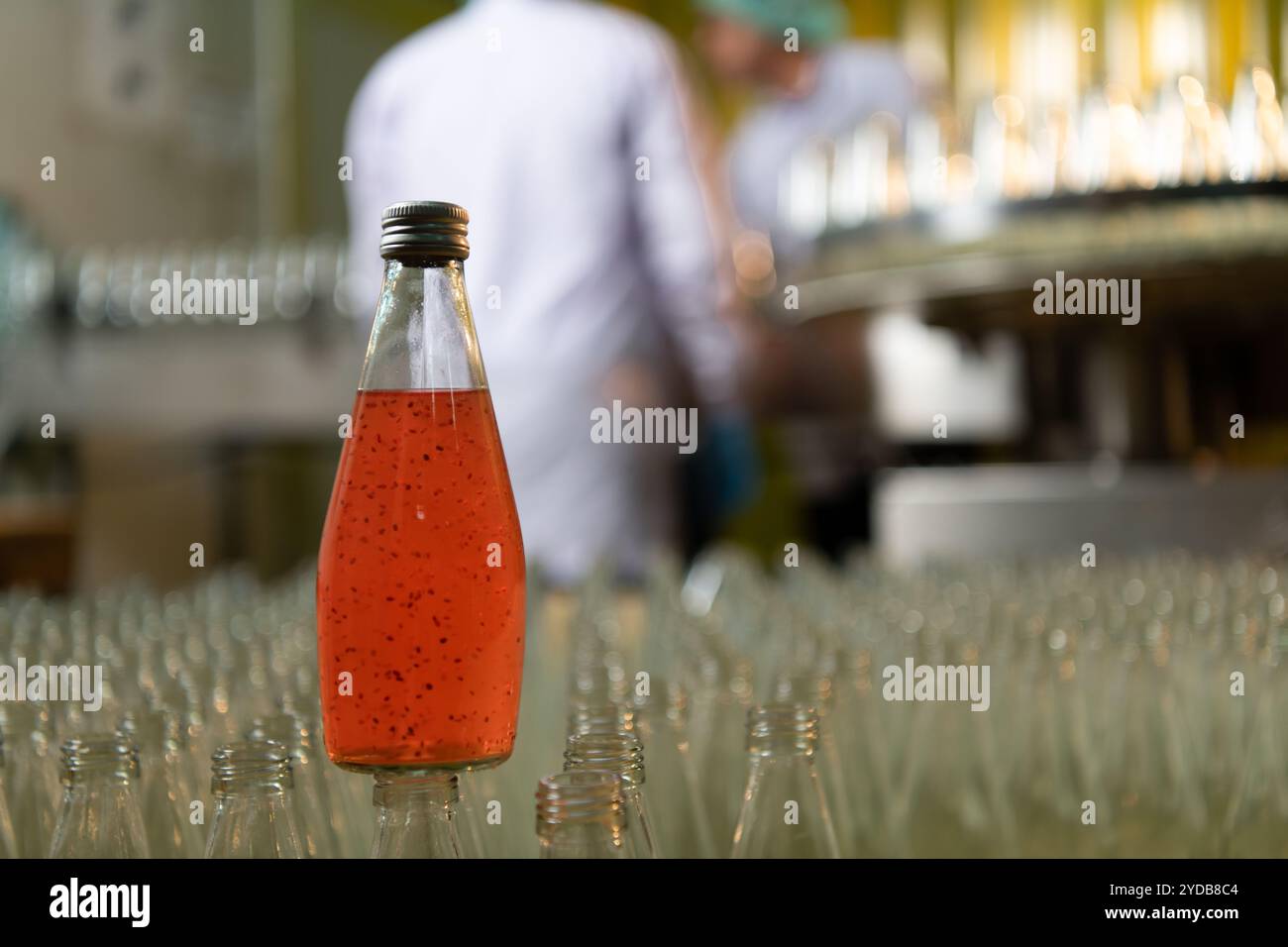 Product quality control officer in fruit juice production line Carry ...