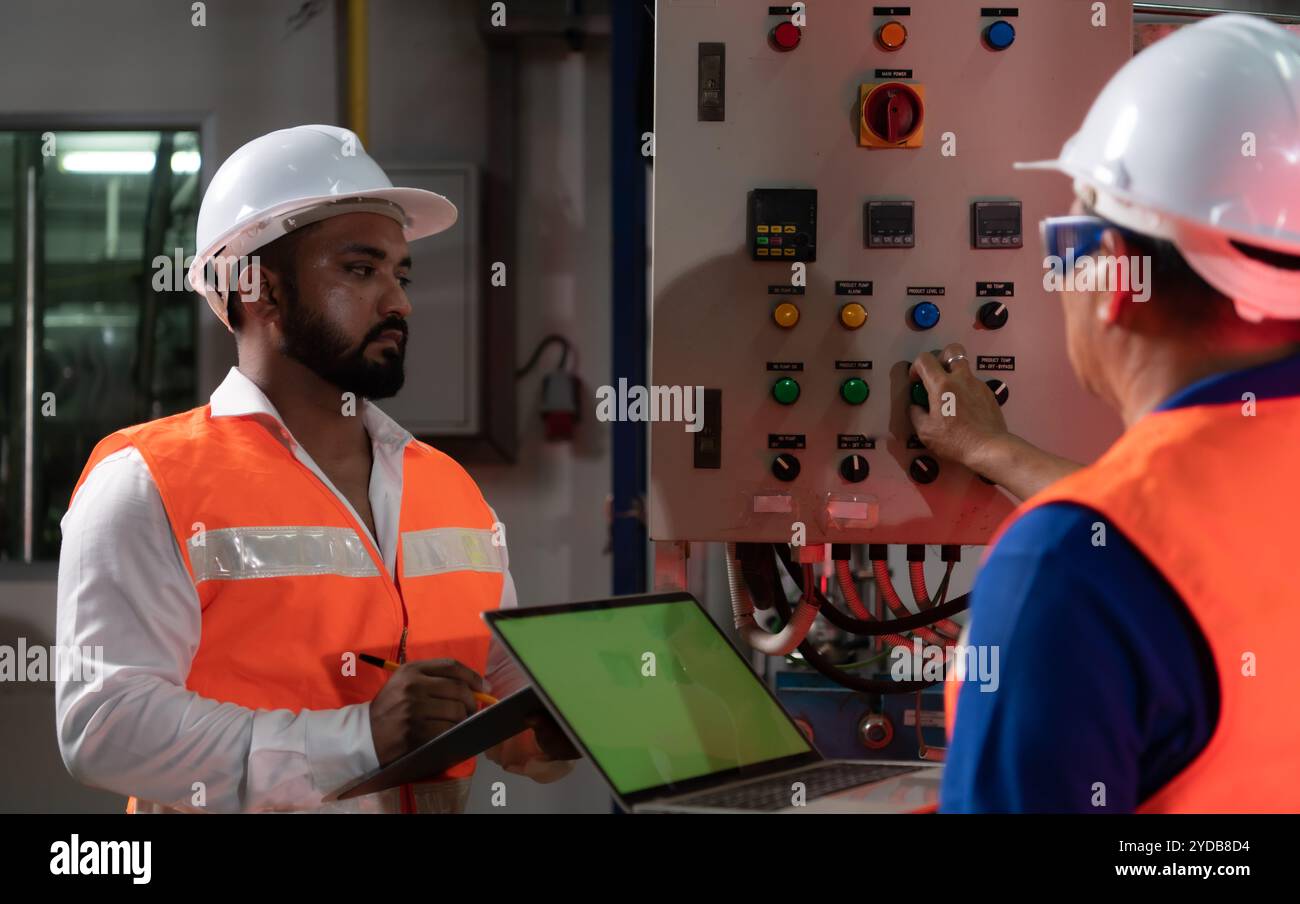 Engineer of a mechanical plant Inspecting and explaining the ...