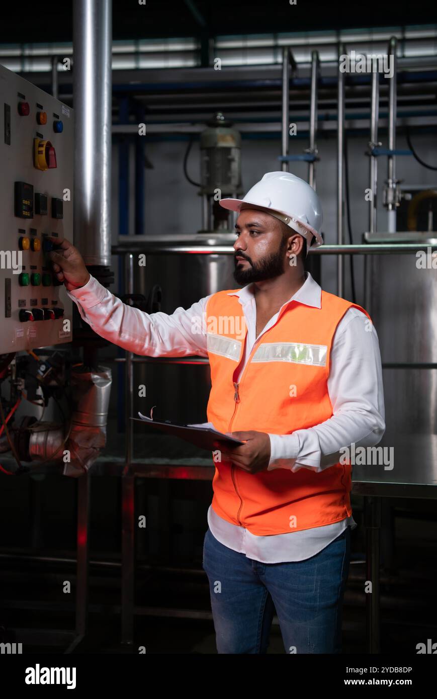 Engineer of Mechanical Plant Checking the electronic circuit of the ...
