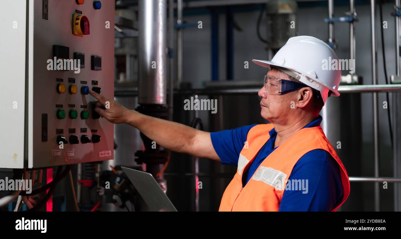 Engineer of Mechanical Plant Checking the electronic circuit of the ...