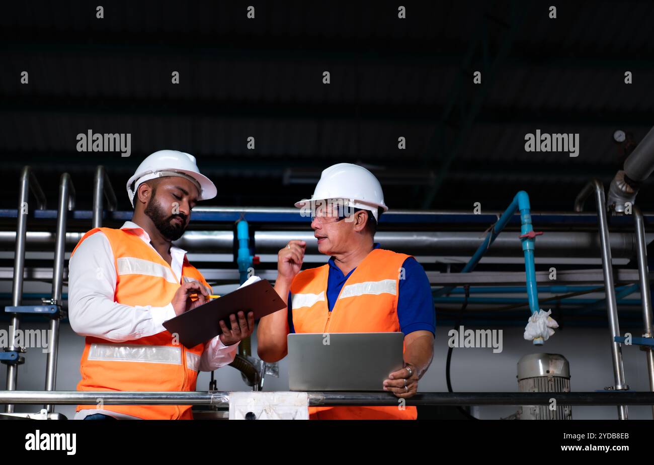 Chief engineer of a mechanical plant Inspecting and explaining the ...