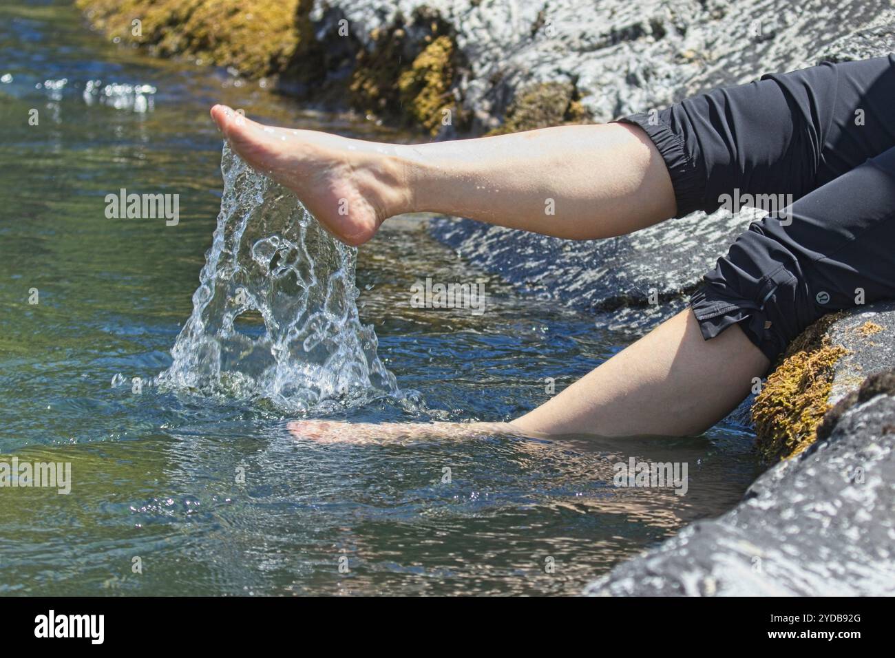 Feet kicking hi-res stock photography and images - Alamy