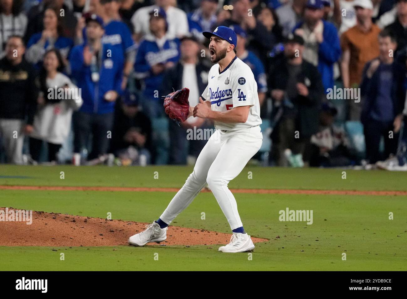 Los Angeles Dodgers relief pitcher Alex Vesia celebrates after New York ...