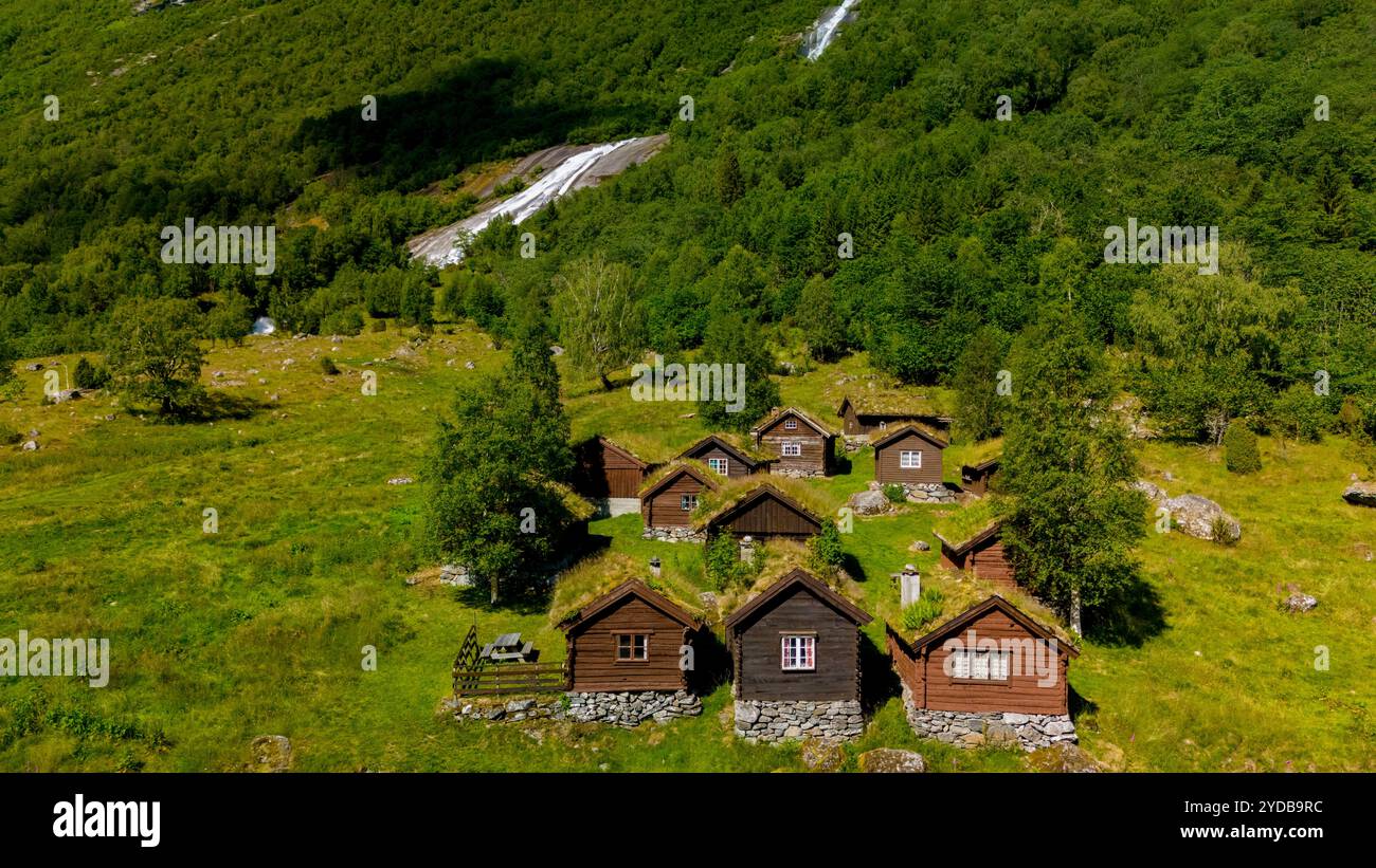 Norwegian Village Nestled Beneath a Waterfall, lovatnet lake Lodal ...