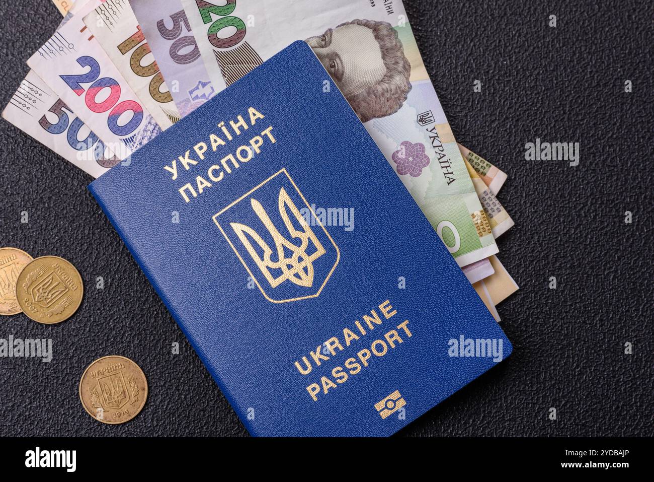 Biometric Ukrainian passport, flight tickets and money Stock Photo - Alamy