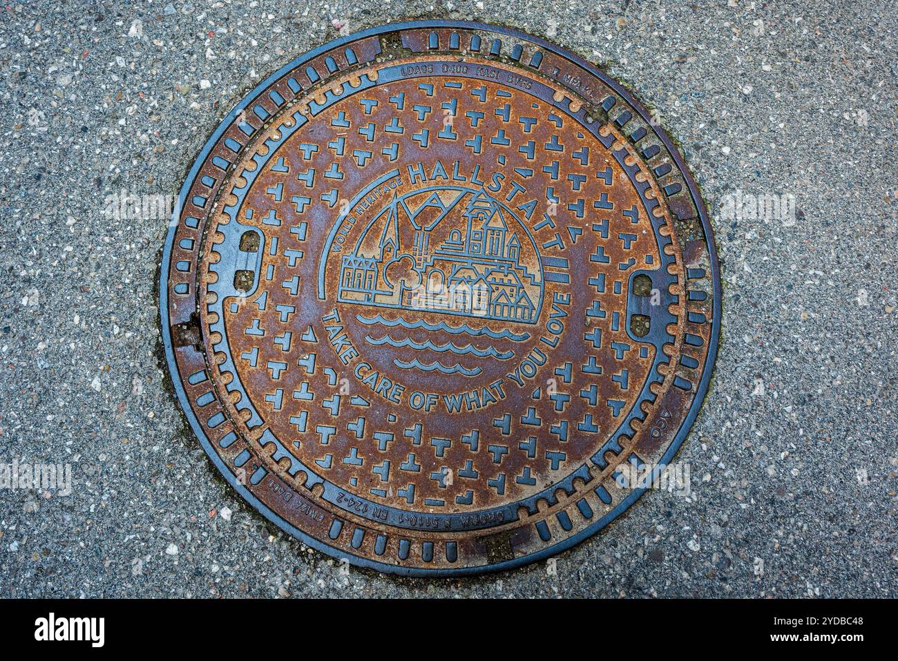 Manhole cover with pattern in Hallstatt, Austria Stock Photo - Alamy