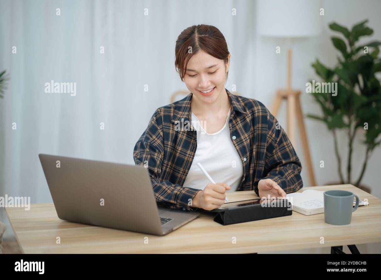 Portrait of Asian Business woman working from office taking reading and ...