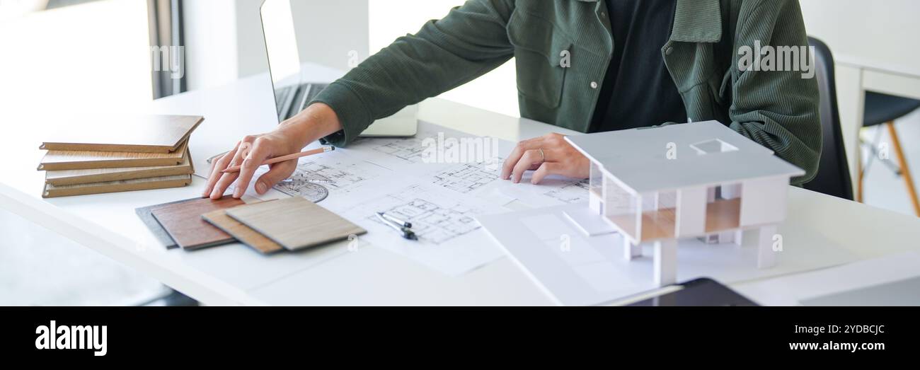 Architecture Man drawing on architectural Creative project business ...