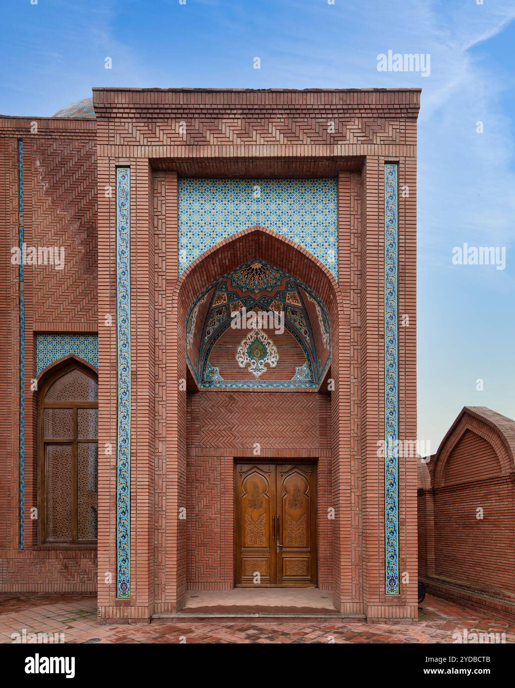 Side entrance of Goy Imam Mosque features stunning red brick patterns ...