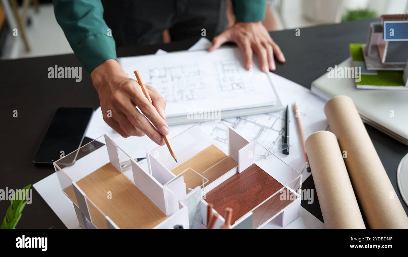 Architecture Man drawing on architectural Creative project business ...