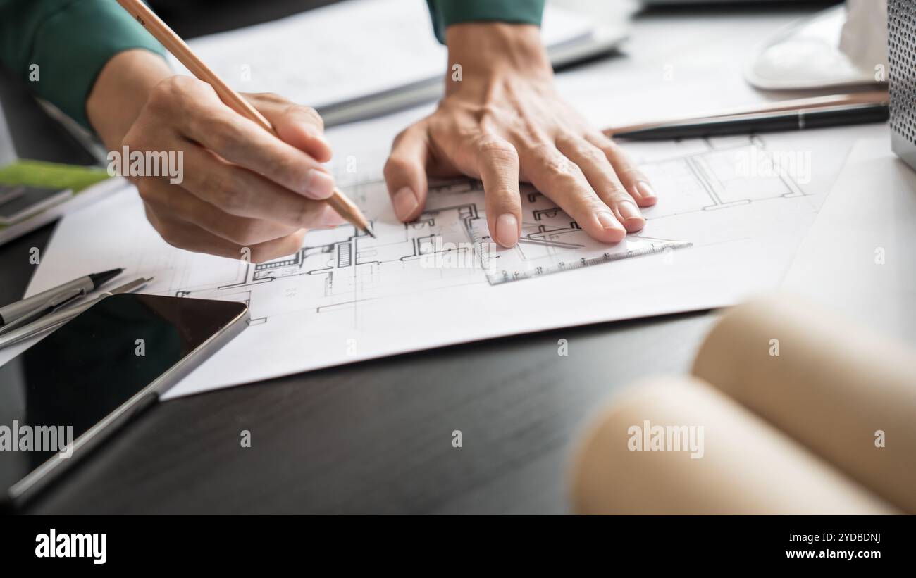 Architecture Man drawing on architectural Creative project business ...