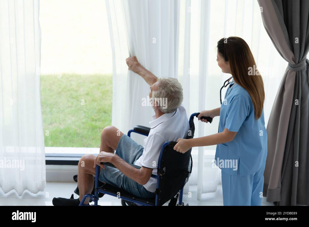 Doctor talking to elderly patient with symptoms of depression Look at ...