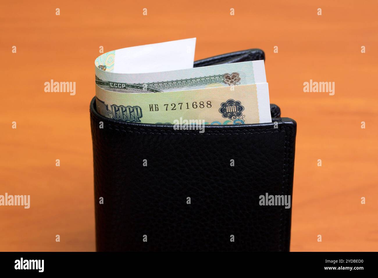 Old Russian ruble in the black wallet Stock Photo - Alamy