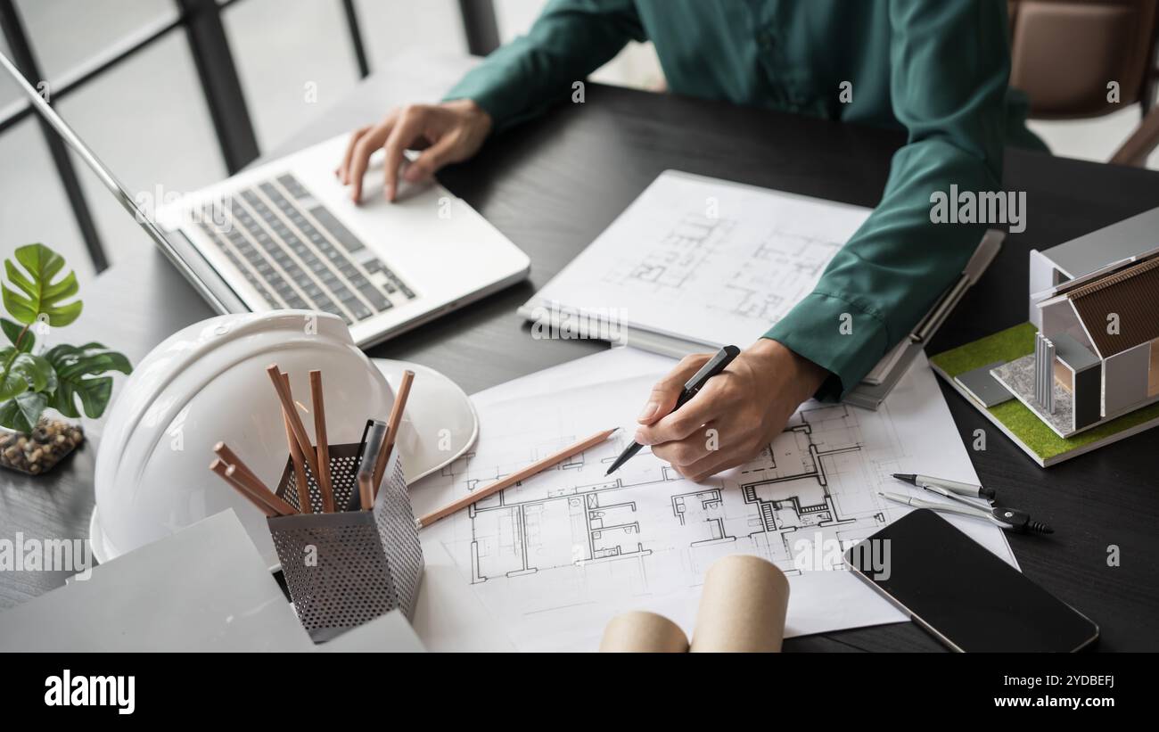 Architecture Man drawing on architectural Creative project business ...