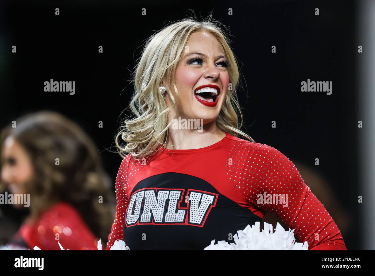 October 25, 2024: A UNLV Rebels cheerleader smiles towards the crowd ...