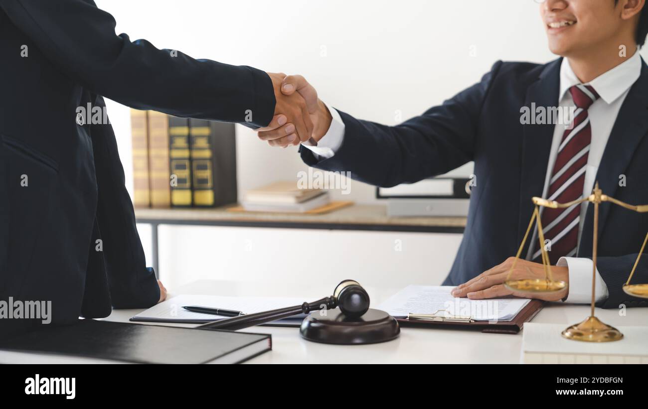 Lawyer consultant shaking hand with client sign contract agreement ...