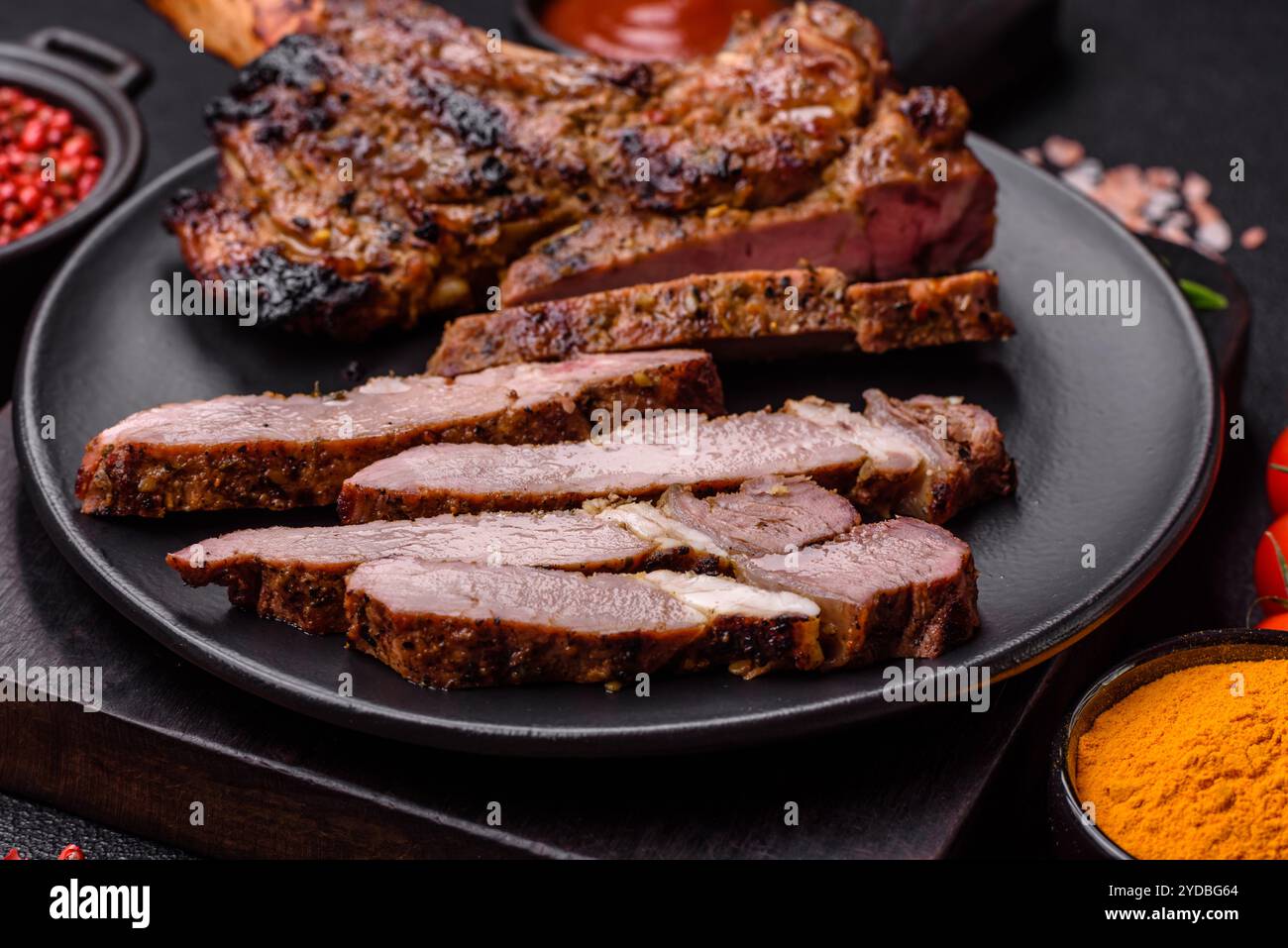 Juicy beef tomahawk steak on the bone baked on the grill Stock Photo ...