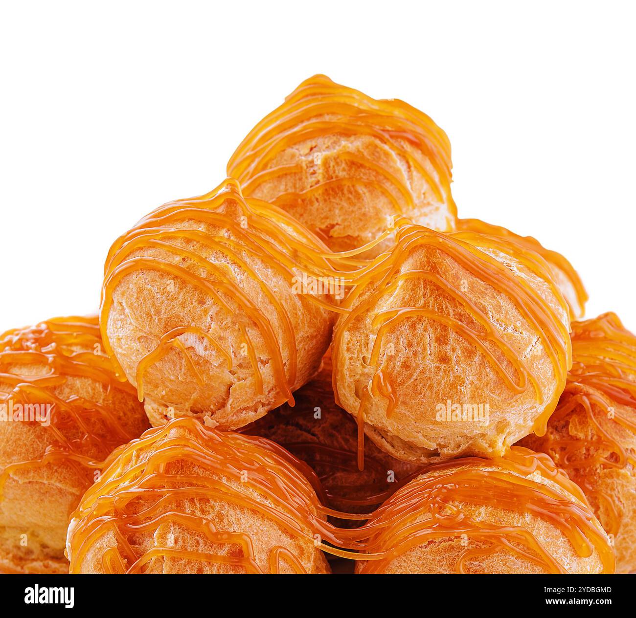 Tasty round eclairs with cream on white background Stock Photo - Alamy