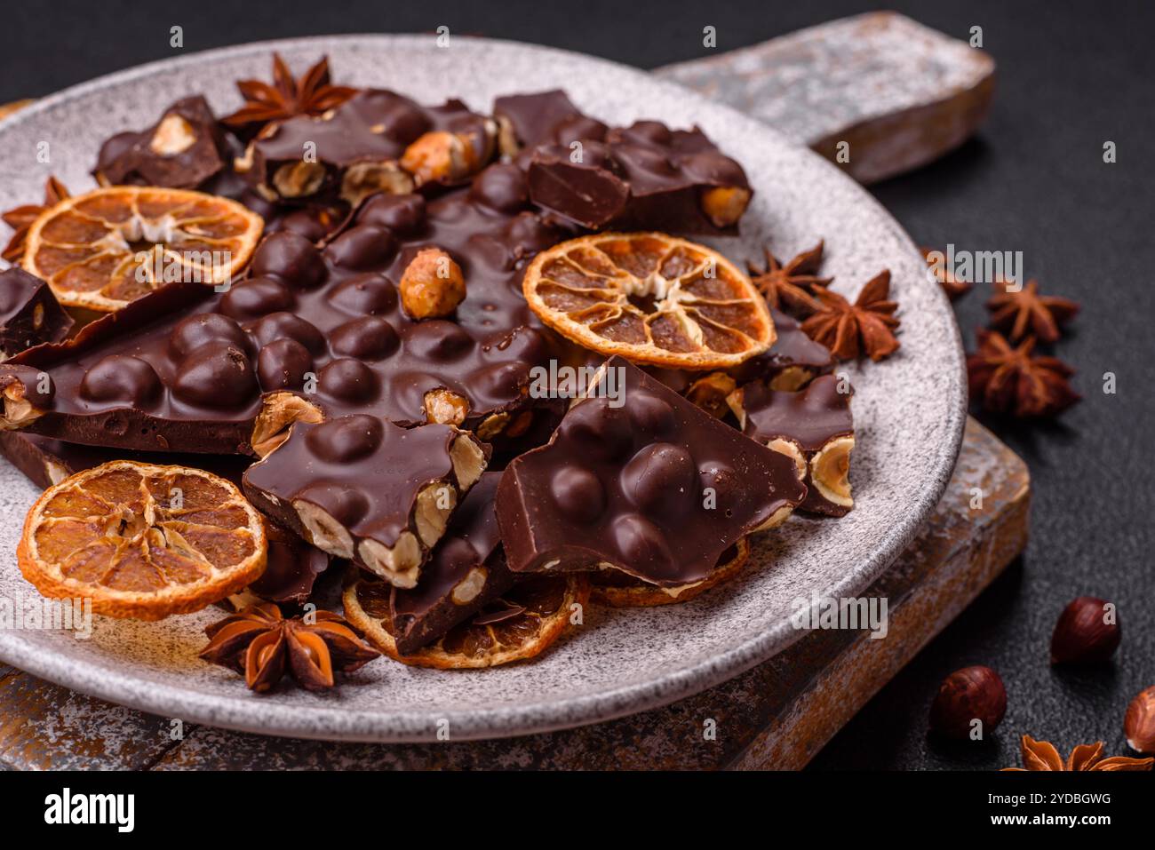 Black bitter chocolate with whole hazelnuts, candied fruits and mint ...