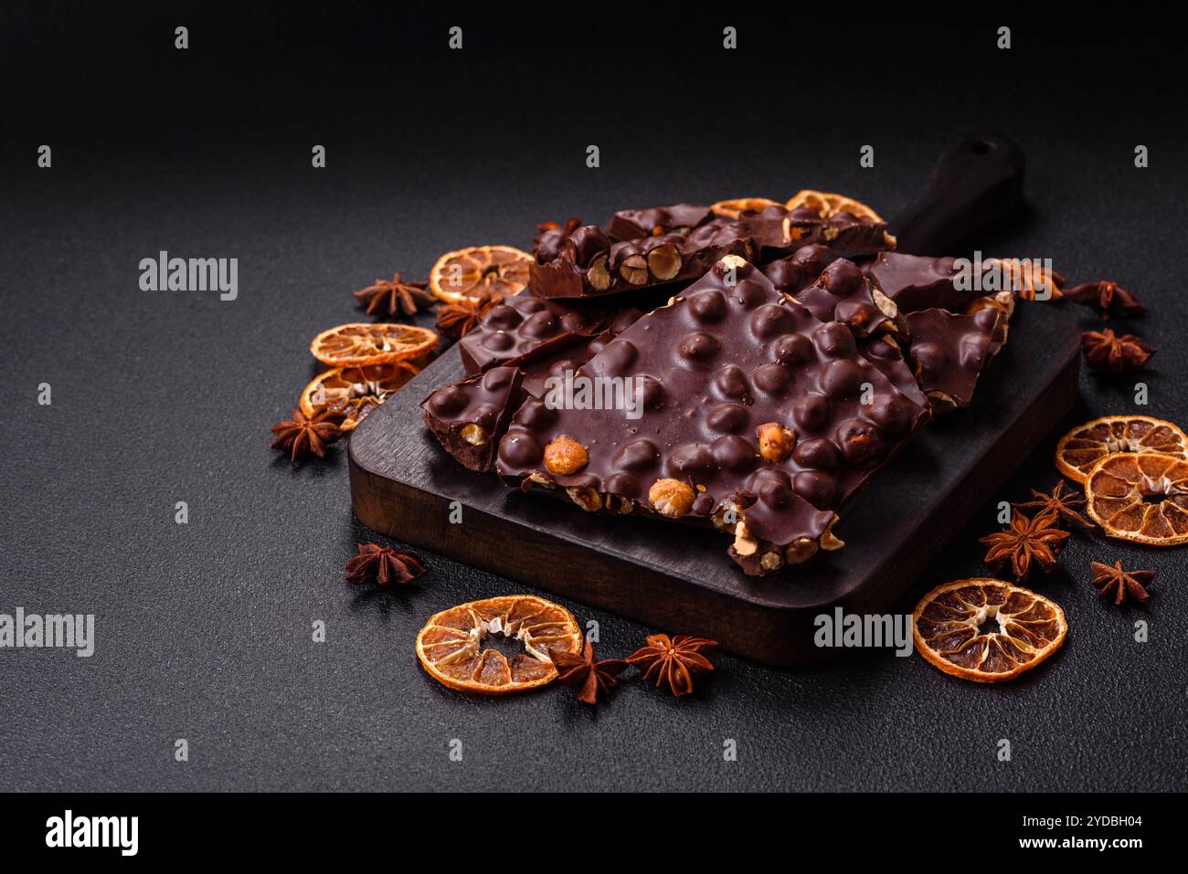 Black bitter chocolate with whole hazelnuts, candied fruits and mint ...