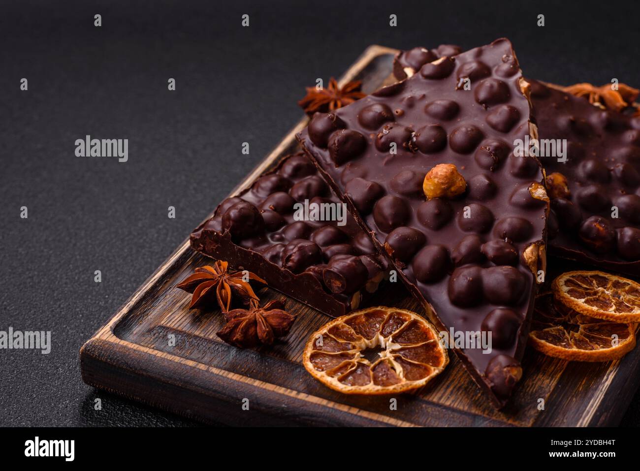 Black bitter chocolate with whole hazelnuts, candied fruits and mint ...