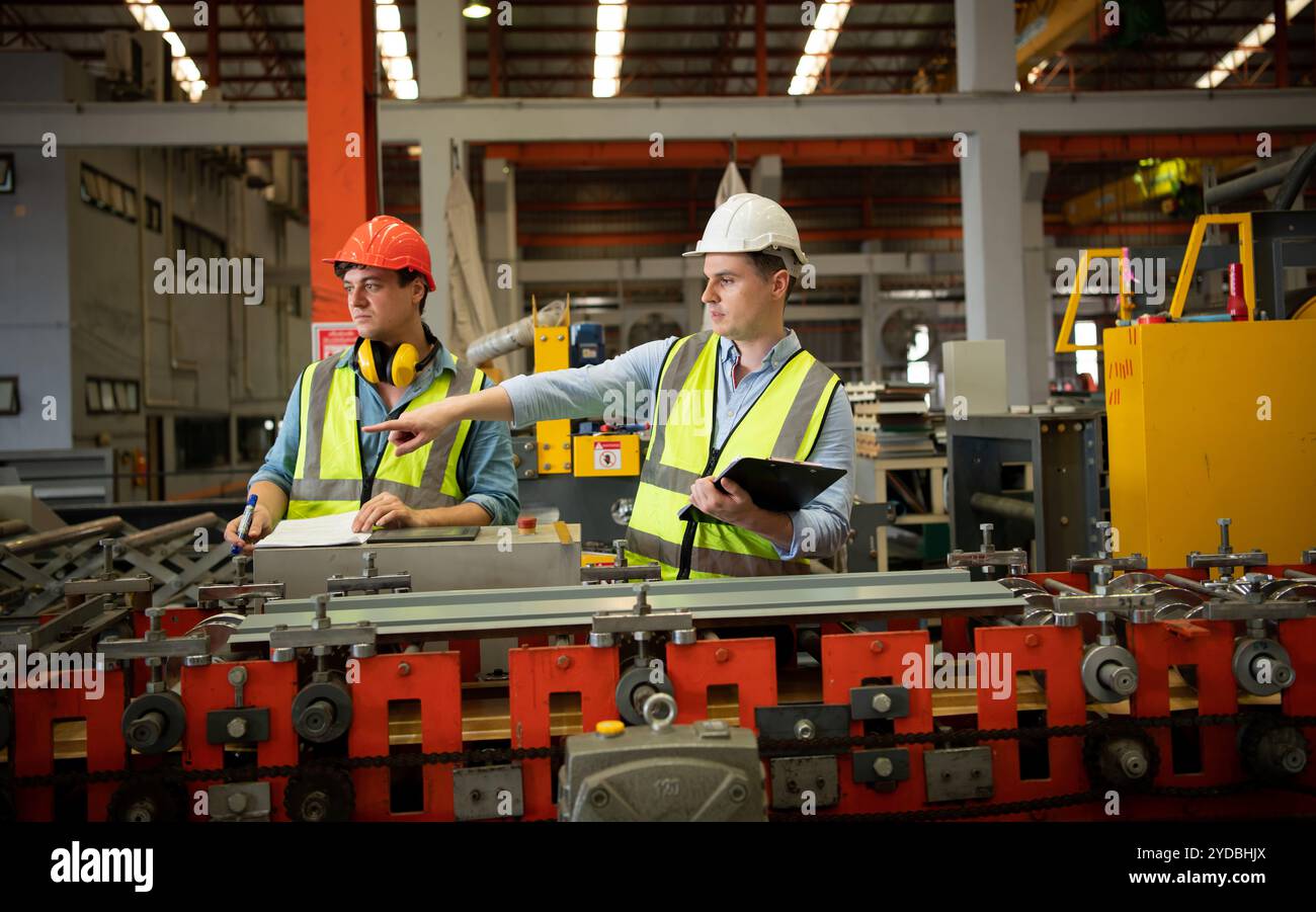 Worker operating testing machine hi-res stock photography and images ...