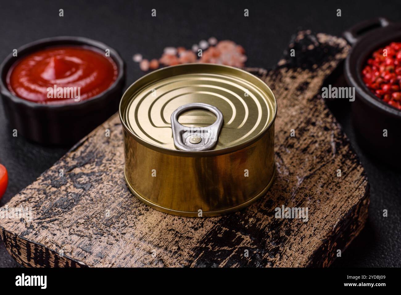 Round metal can with canned meat or fish with a key Stock Photo - Alamy
