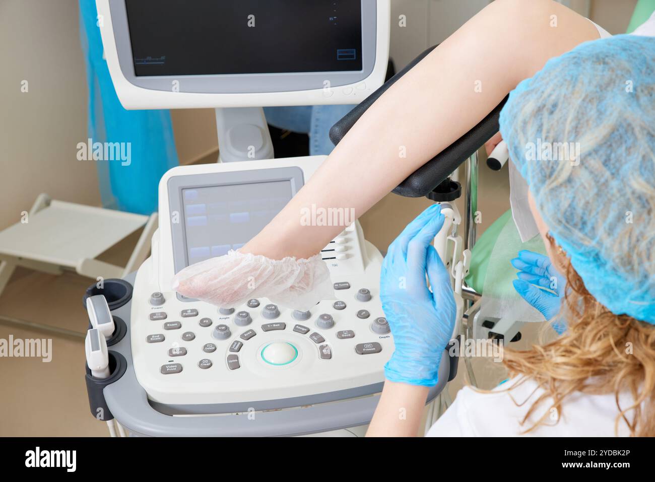 Cropped view of gynecologist and patient doing ultrasound scan Stock ...