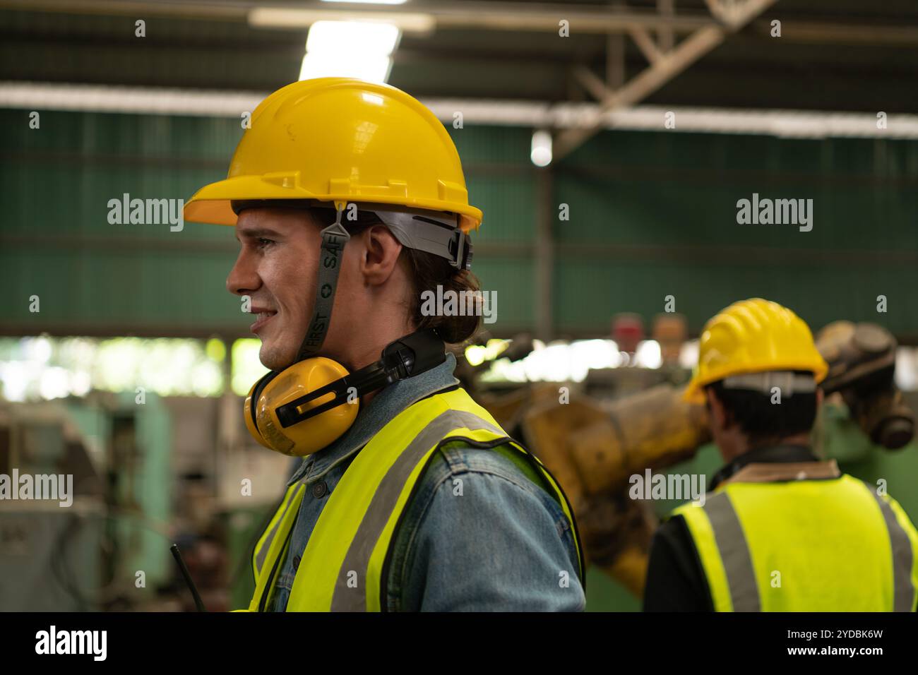 Chief mechanical engineer working in a mechanical factory Stock Photo ...