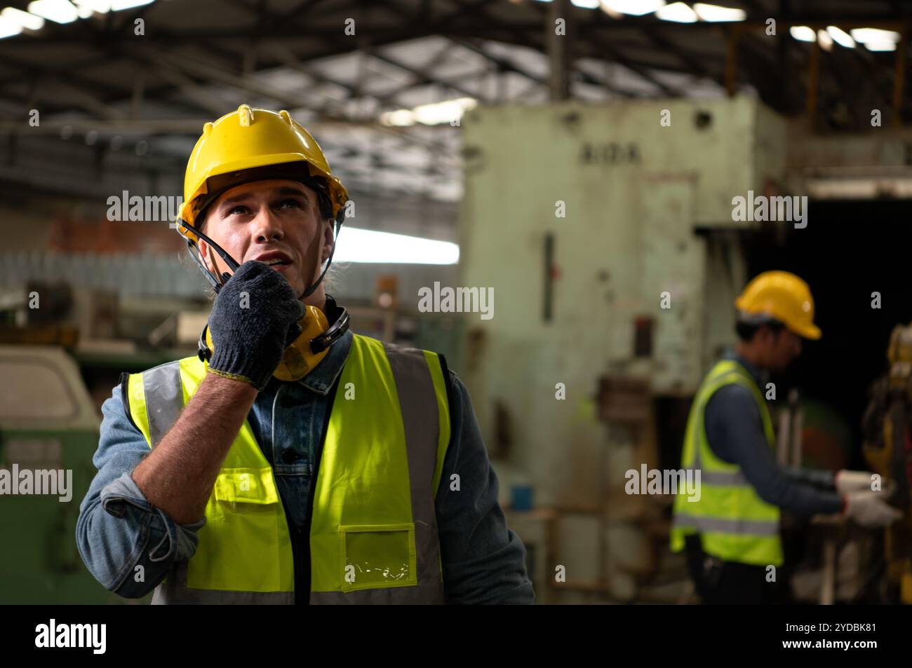 Chief mechanical engineer working in a mechanical factory Stock Photo ...
